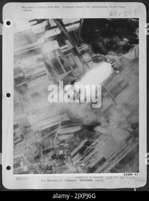 An 8th AF Consolidated B-24 Liberator of the 448th Bomb Group, comes in ...