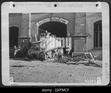 The first tanks and tank destroyers enter Aachen, Germany, where ...