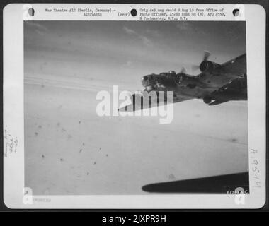 Bursts of deadly flak explode around a formation of Boeing B-17 Flying ...
