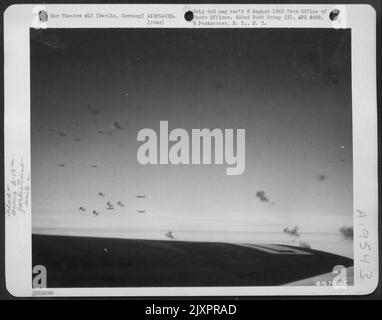 Bursts of deadly flak explode around a formation of Boeing B-17 Flying ...