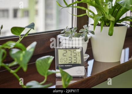 Measuring temperature with a digital thermometer in water Stock Photo ...