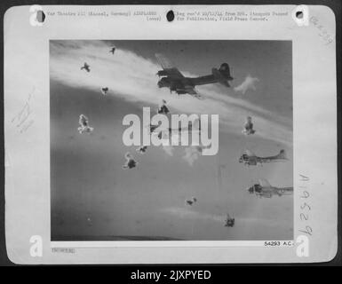 Bursts Of Deadly Flak Explode Around A Formation Of B-17 Flying ...