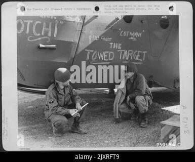 Two Members Of The 439Th Troop Carrier Group Examine Flak Damage On A ...