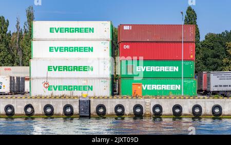 A picture of multiple colorful shipping containers in the Port of ...