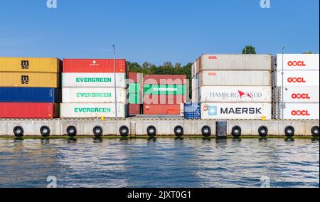 A picture of multiple colorful shipping containers in the Port of ...