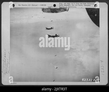 Bombs From The Consolidated B-24 Liberators Fall On Nazi Installations ...