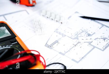 Making repairs,planning electricity project in house.Drawings,diagrams ...