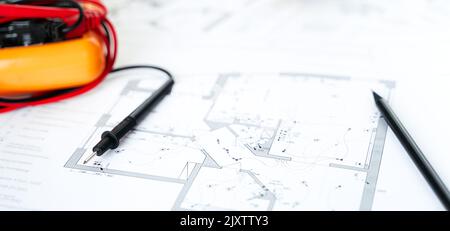 Making repairs,planning electricity project in house.Drawings,diagrams ...