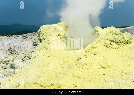 cone of sulfur deposits around a fumarole in a solfataric field Stock ...