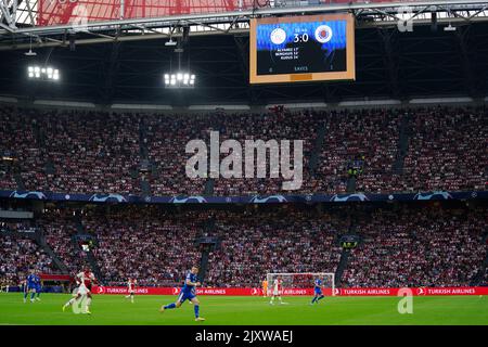 The big screen displays the 0-2 scoreline during the Premier League ...