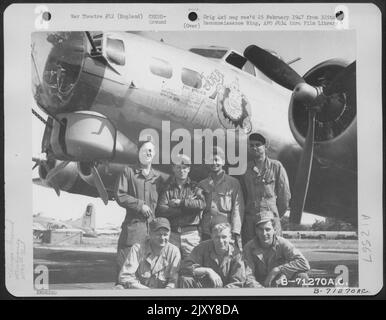 A Ground Crew Of The 390Th Bomb Group Poses Beside The Boeing B-17 The ...
