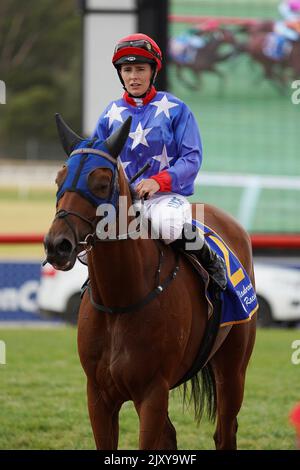 Jockey Georgina Cartwright returns to scale after riding Chapel City to ...