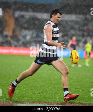 Charlie Constable of the Cats kicks a goal during the Round 2 AFL match ...