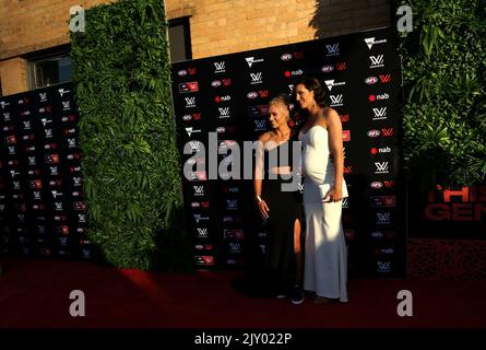 Erin Phillips of the Crows (left) and wife Tracy Gahan pose for photos ...