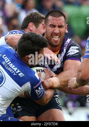 Nelson Asofa-Solomona of the Storm is tackled by Pita Godinet (left ...