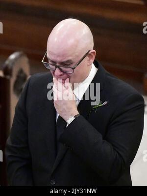 Husband Trent Goldsack reacts during the Memorial Service for ...