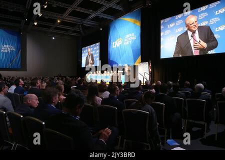 LNP members listen as Prime Minister Scott Morrison speaks during the ...
