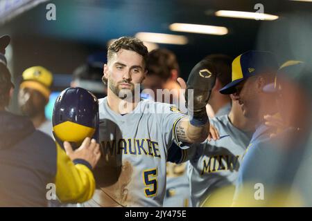 Milwaukee Brewers' Garrett Mitchell (5) scores on an RBI single hit by ...