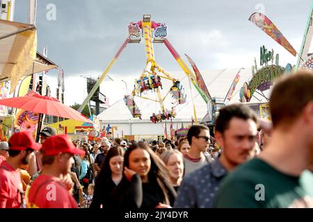 A crowd is seen at Sideshow alley during the Brisbane Royal Exhibition ...