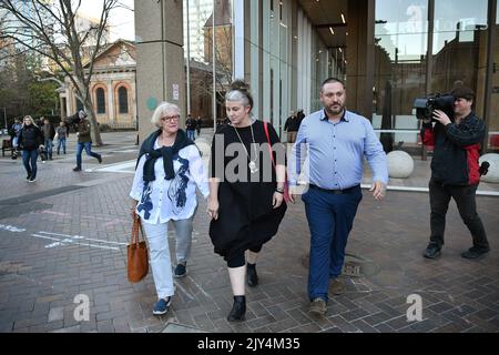 Lisa Giles (centre) leaves the NSW Supreme Court in Sydney, Tuesday ...