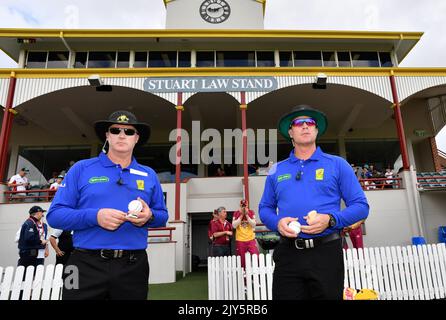 Umpires Gerard Abood (left) and Donovan Koch (right) are seen during ...