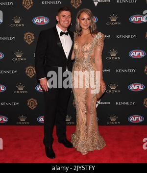Dayne Zorko of the Lions and his partner Talia Demarco are seen ...