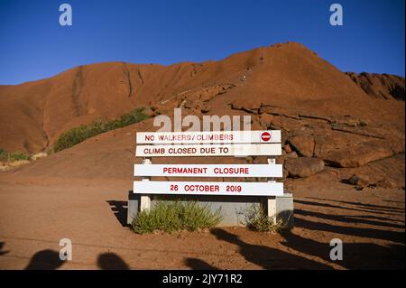 The newly installed sign indicating the permanent closure of the climb ...