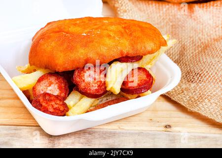 Traditional South African Russian and slap chips Stock Photo - Alamy