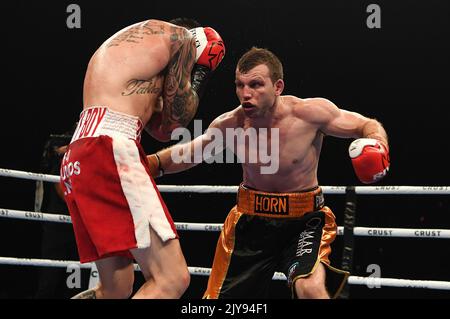 Australian boxers Jeff Horn and Michael Zerafa compete during the ...