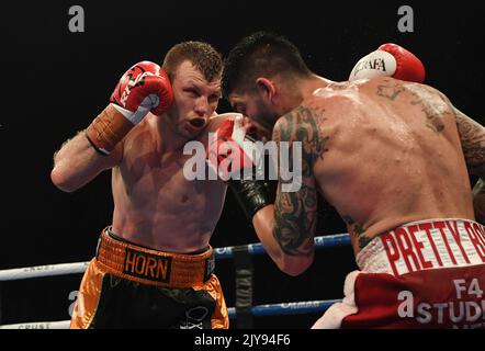 Australian boxers Jeff Horn (left) and Michael Zerafa fight during ...