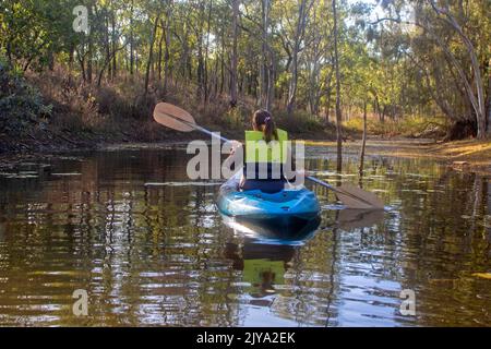 Kayaking on the dam at Cobbold Gorge Village Stock Photo - Alamy