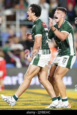 Jordan Riki jumps on Corey Harawira-Naera of the Maori Kiwis after the ...