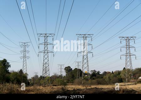 Multiple Overhead Electrical Powerlines traversing urban green space ...