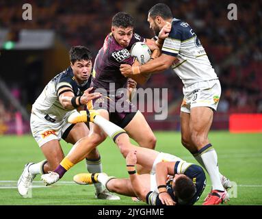 Jordan Riki (centre) of the Broncos in action during the Round 20 NRL ...
