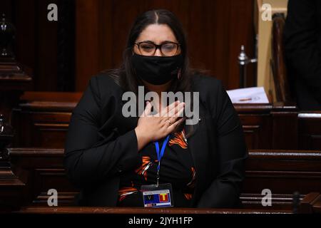 Sheena Watts reacts as she is sworn in during a Joint Parliamentary ...
