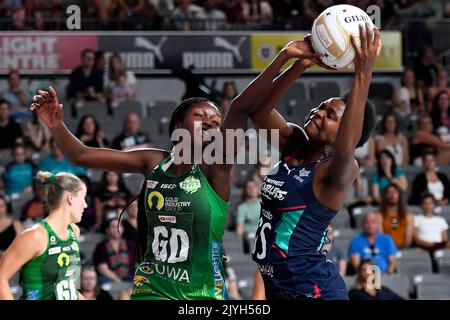 Sunday Aryang of the Fever and Mwai Kumwenda of the Vixens compete for ...