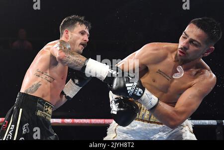 Ben Mahoney (right) is seen landing a punch on Benjamin Hussain (left ...