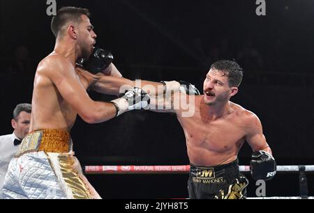 Ben Mahoney (right) is seen landing a punch on Benjamin Hussain (left ...