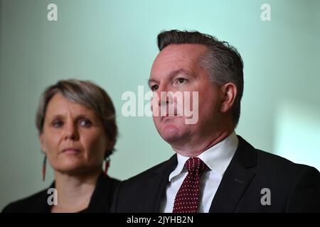 Labor member for Dunkley Peta Murphy cuddles a Labrador puppy trained ...