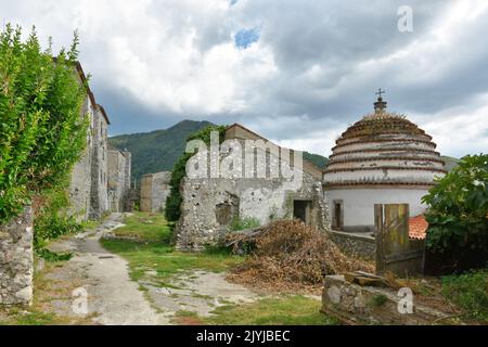 A street among the old buildings of Vairano Paterona, a medieval ...