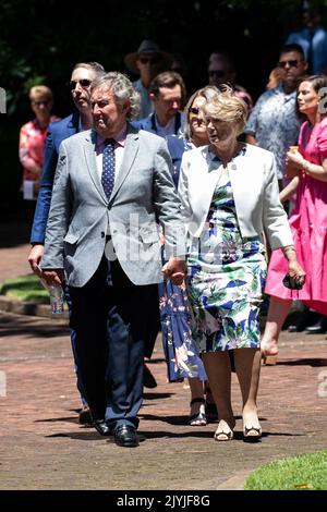 The parents of Senior Constable Kelly Foster are seen in front of her ...