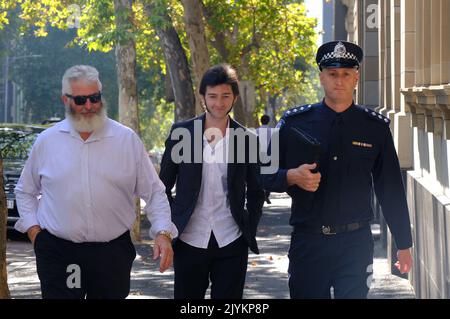 Husband of Senior Constable Lynette Taylor, Stuart Schultz, walks next ...