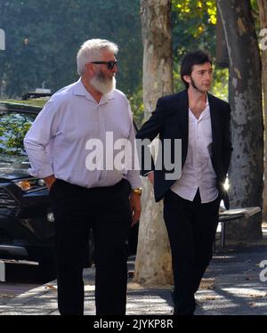 Husband of Senior Constable Lynette Taylor, Stuart Schultz, walks next ...