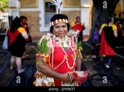 Scholastica Korihio, dressed in traditional Manus Island attire, poses ...