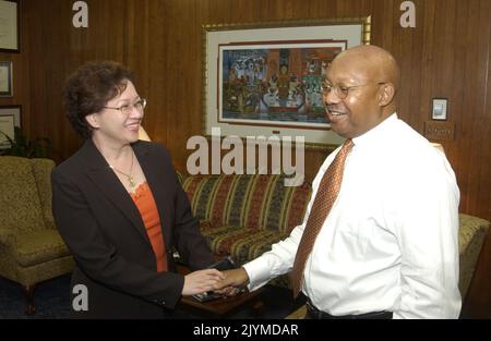 Secretary Alphonso Jackson with Jane Gatchalian. Secretary Alphonso ...