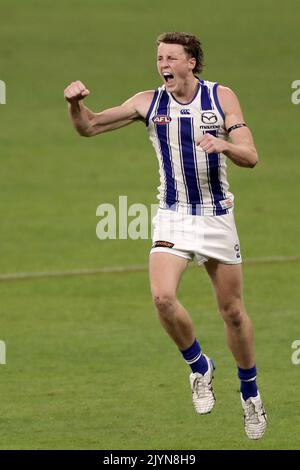 Nick Larkey of the Kangaroos celebrates after kicking a goal during the ...