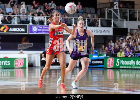 Maddy Proud of the Swifts passes the ball during the Round 9 Super ...