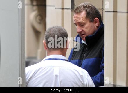 Geoffrey Armour is led into a prison van at the Supreme Court in ...