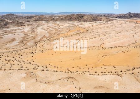 Badlands and dry river beds after years of drought, aerial view, drone ...