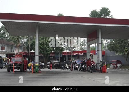 Semarang, Indonesia - September 3, 2022: Residents refuelling the ...